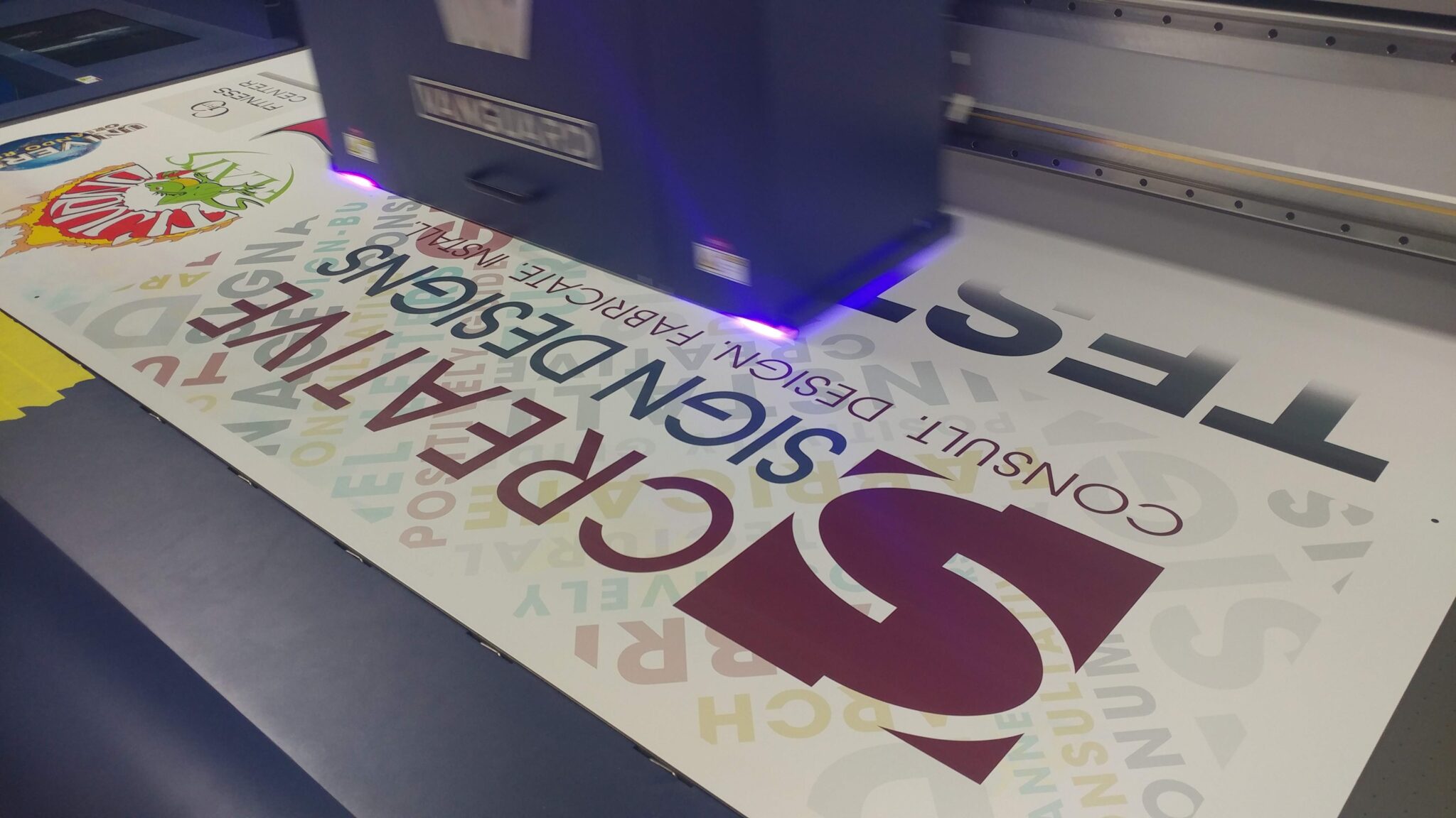 The Advantages of a Large-Format UV Flatbed Printer | Creative Sign Designs